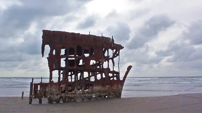 spooky shipwreck on beach flowing tide Stock Footage Video (100% ...