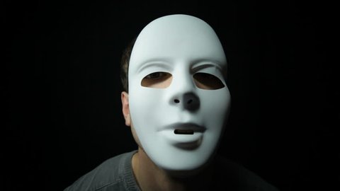 scary masked man over dark background Stock Footage Video (100% Royalty ...