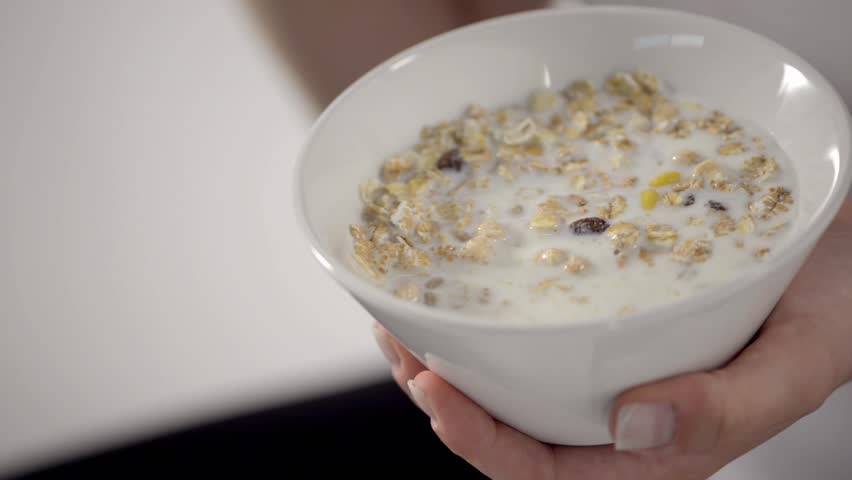 young girl eats cereals - close Stock Footage Video (100% Royalty-free ...