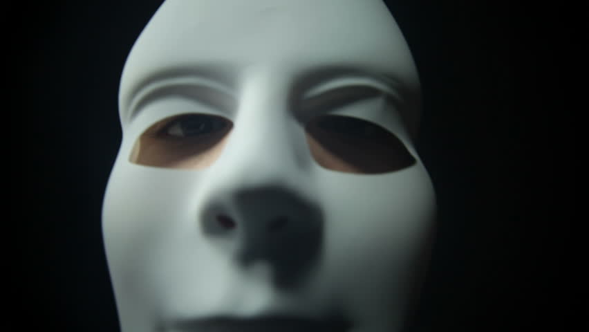 scary masked man over dark background Stock Footage Video (100% Royalty ...