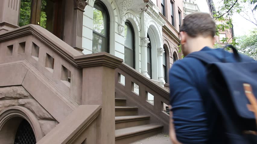 Man Walks up Brownstone Stoop Stock Footage Video (100% Royalty-free ...