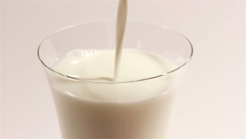 Milk Flowing in Transparent Cup Stock Footage Video (100% Royalty-free ...