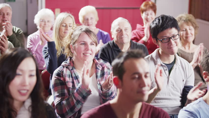 Cheerful Audience Members at a Stock Footage Video (100% Royalty-free ...