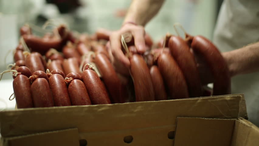 traditional sausages being packed into boxes Stock Footage Video (100% ...