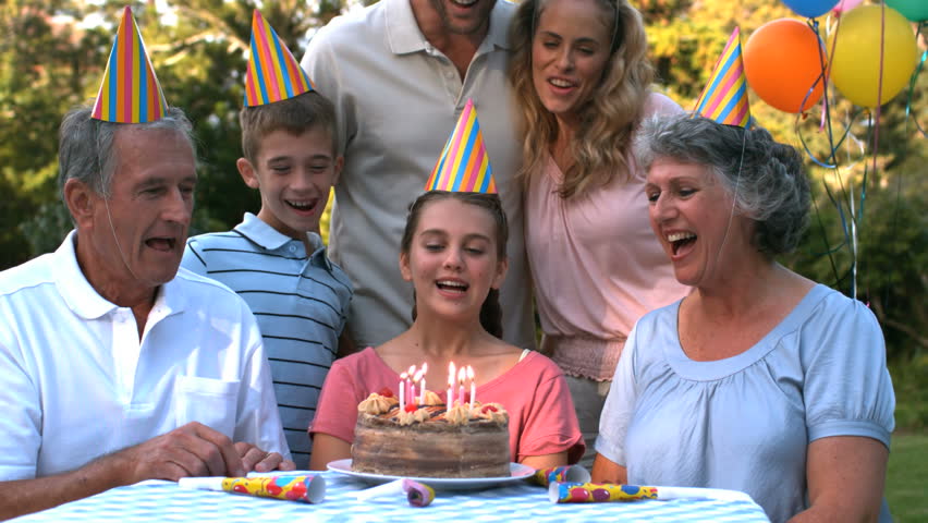 extended family celebrating birthday together on Stock Footage Video ...