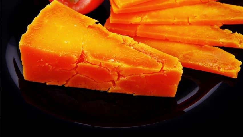 orange aged delicious cheddar cheese chop Stock Footage Video (100% ...