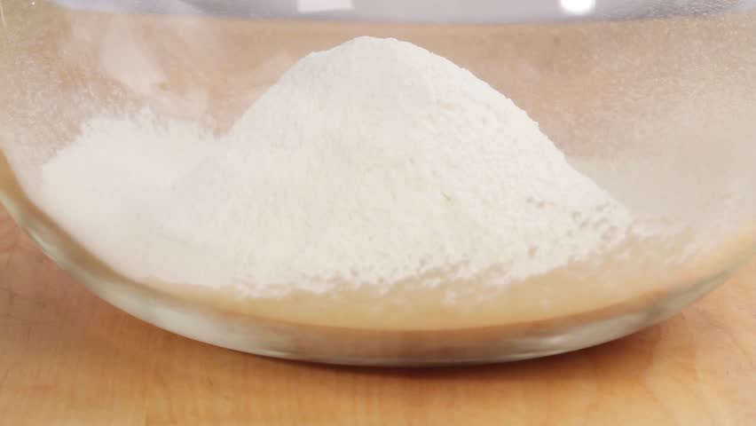 flour being sieved into bowl Stock Footage Video (100% Royalty-free ...