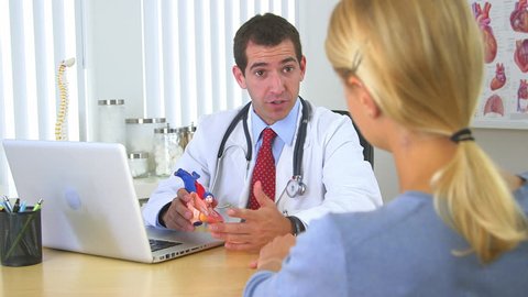 Doctor Explaining Heart Procedure Patient Stock Footage Video (100% ...