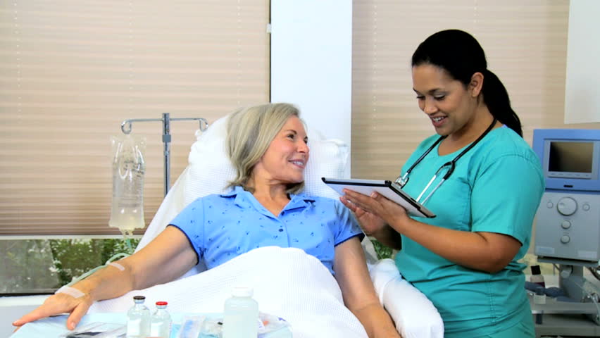 medical staff using tablet care plan: video de stock (totalmente libre ...