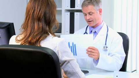 Female Pharmaceutical Representative Discussing Clinical Trial Stock ...