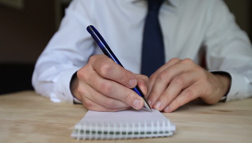 Businessman Writing in Notepad, Interview Stock Footage Video (100% ...