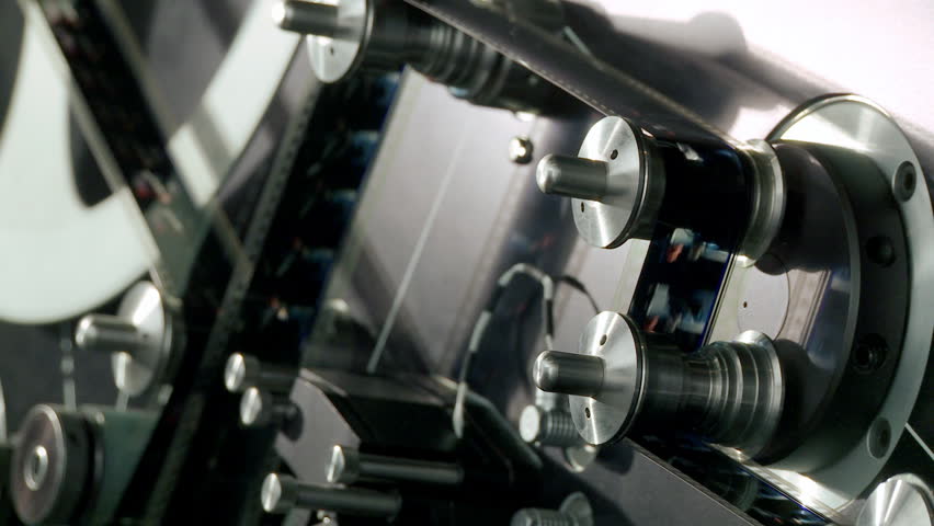35mm film moving through telecine machine Stock Footage Video (100% ...