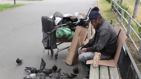 Homeless Man Ragged Clothes Throwing Bread Stock Footage Video (100% ...