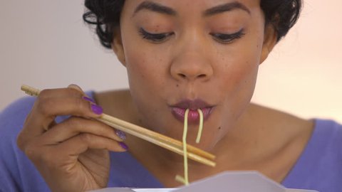 African American Woman Using Chopsticks Eat Stock Footage Video (100% ...