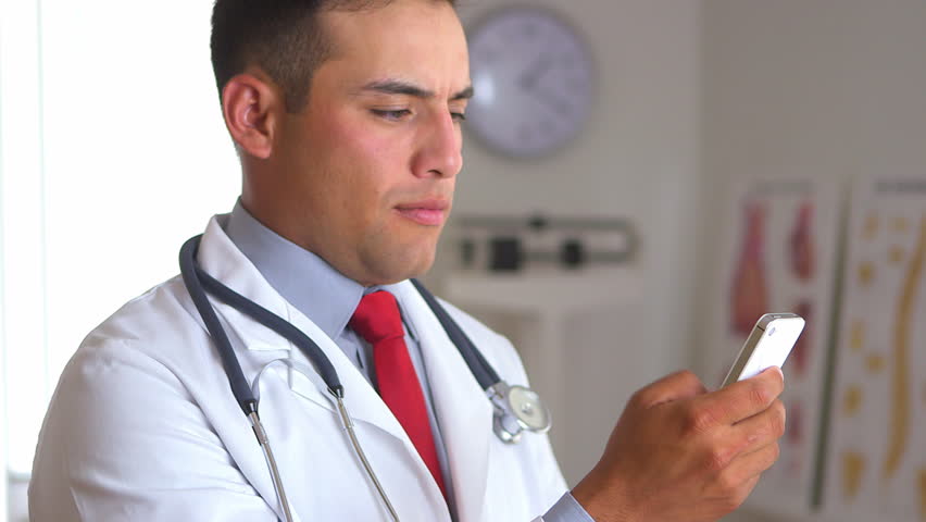 Mexican Doctor Using Smartphone Stock Footage Video (100% Royalty-free ...