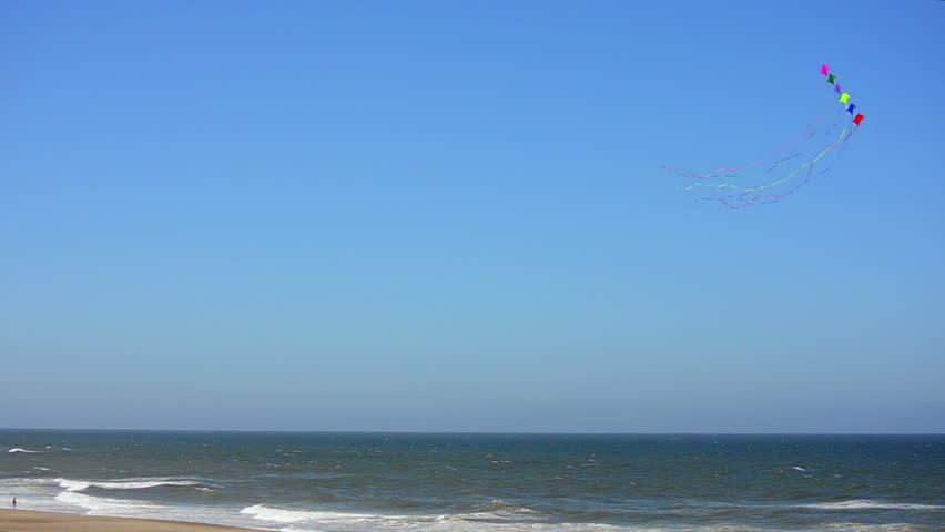 colorful kites flying over pacific ocean Stock Footage Video (100% ...