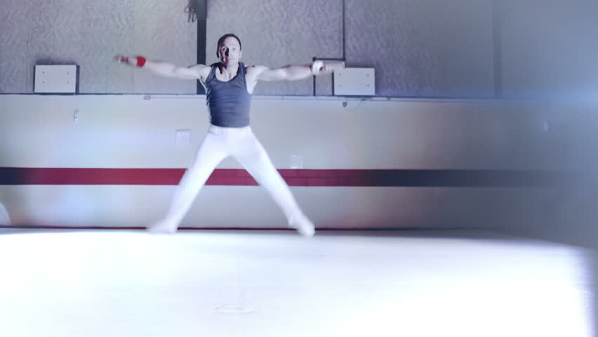 gymnast doing straddle jump outstretched arms Stock Footage Video (100% ...