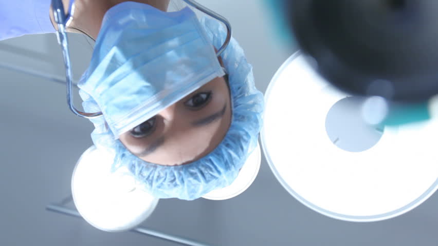 Doctor Looks Down at Patient Stock Footage Video (100% Royalty-free ...