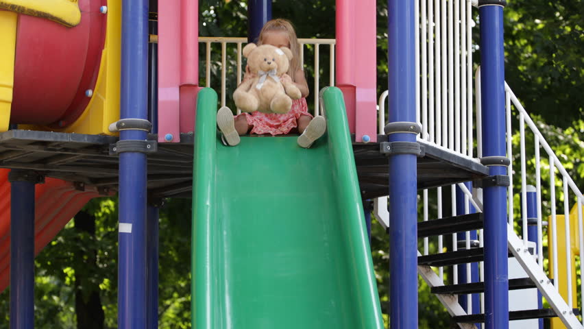 Child Sliding On a Slide Stock Footage Video (100% Royalty-free ...