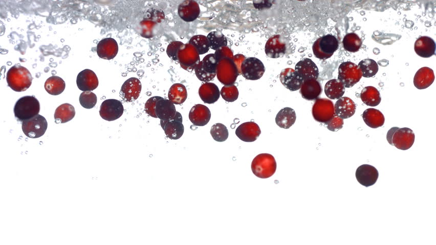 Cranberries Splashing Into Water Slow Motion Stock Footage Video 100