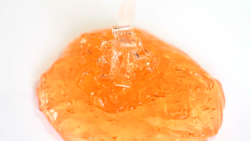 orange fluid gel on whitebackground Stock Footage Video (100% Royalty ...