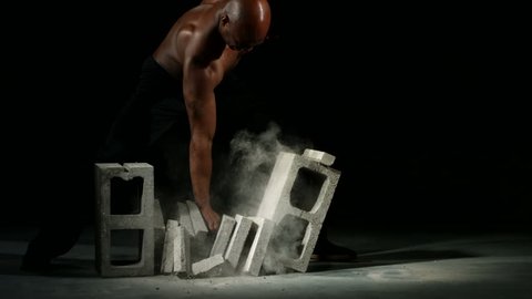Man Breaks Stack Bricks Slow Motion Stock Footage Video (100% Royalty ...