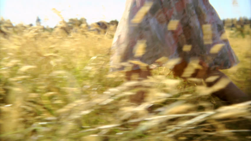 woman walking through field Stock Footage Video (100% Royalty-free ...