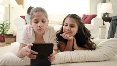 Two Girls Lie On Floor Their Stock Footage Video (100% Royalty-free ...