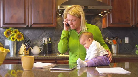 Stressed Out Mom Tries Multitasking While Stock Footage Video (100% ...