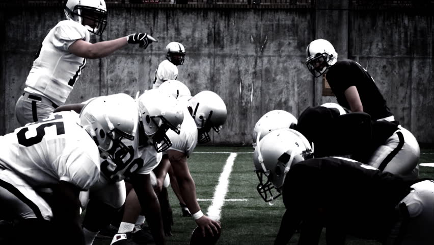 quarterback hikes ball line scrimmage throws Stock Footage Video (100% ...