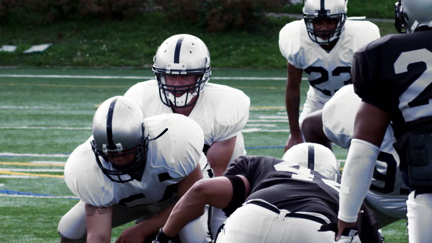 quarterback drops back gets sacked by Stock Footage Video (100% Royalty ...