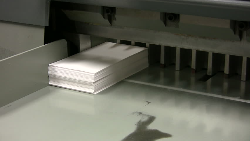 Commercial Paper Cutter Cutting a Stock Footage Video (100% Royalty ...