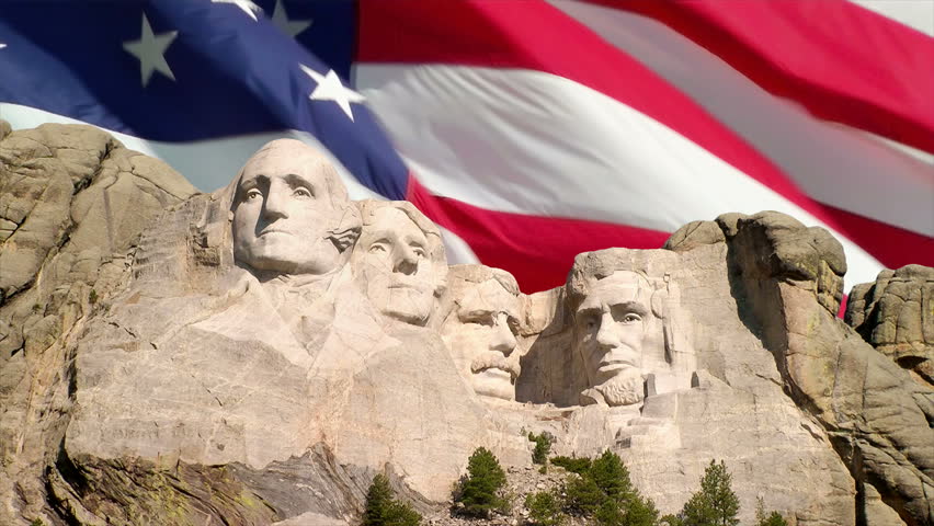 american flag waving behind mount rushmore Stock Footage Video (100% ...