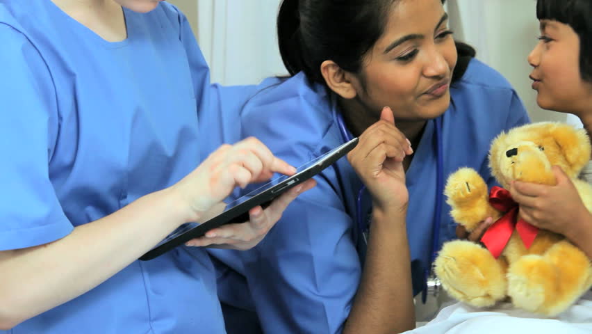nursing staff using wireless tablet information Stock Footage Video ...