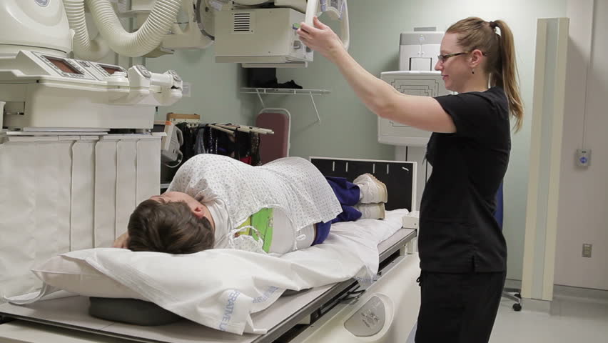 radiology technologist doing medical procedure x-ray Stock Footage ...