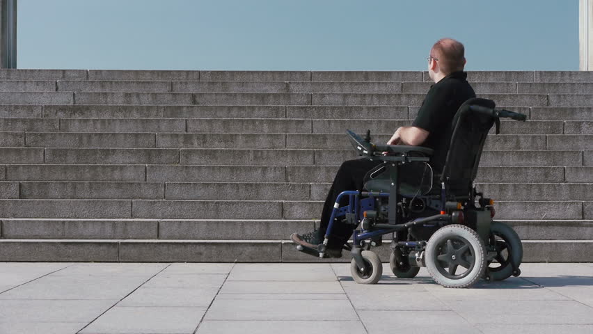 disabled person wheelchair contemplating able people Stock Footage ...