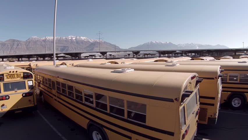 aerial fly over school bus station Stock Footage Video (100% Royalty ...