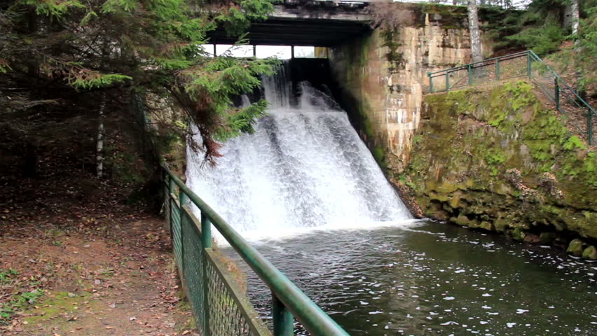 water dam flowing slowly into medium Stock Footage Video (100% Royalty ...