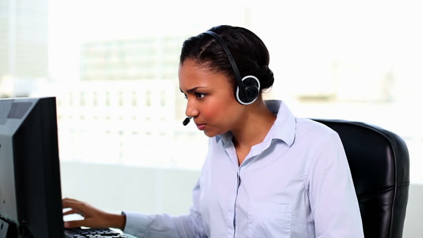 young female agent working sitting her Stock Footage Video (100% ...