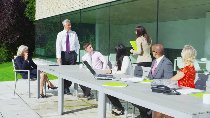 diverse business team outdoor meeting outside Stock Footage Video (100% ...