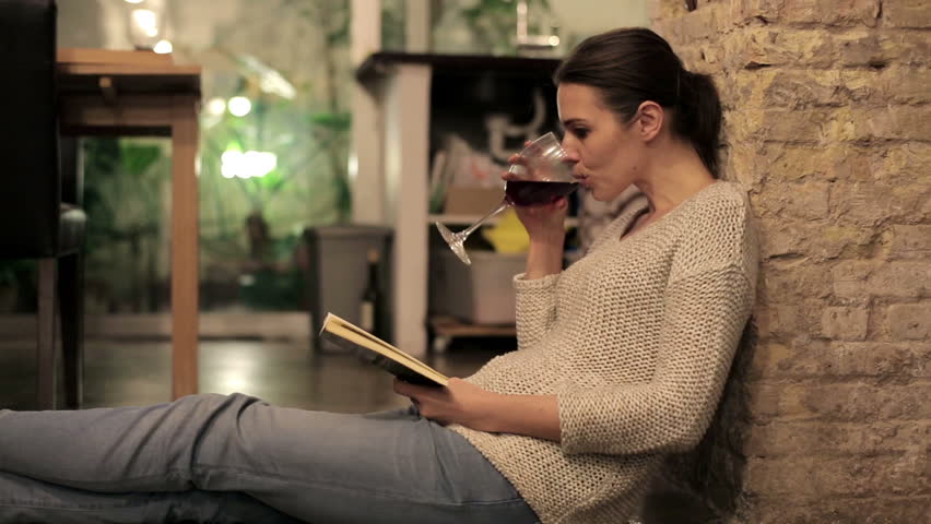 Young Woman Reading Book, Drinking Stock Footage Video (100% Royalty ...