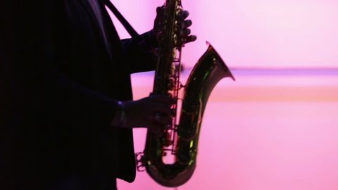 Man Playing Sax While Making Smooth Stock Footage Video (100% Royalty ...