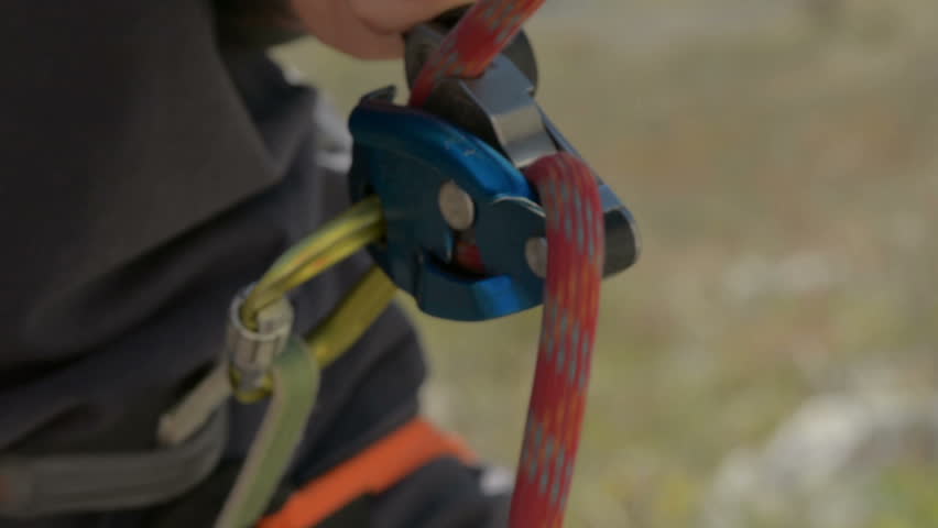 rock climbing rope passes through belay Stock Footage Video (100% ...