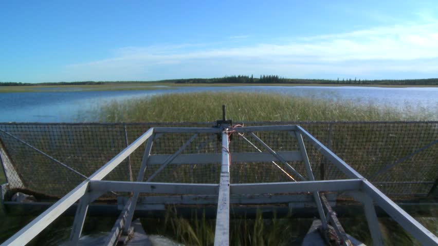 propeller driven airboat harvesting rice wild Stock Footage Video (100% ...