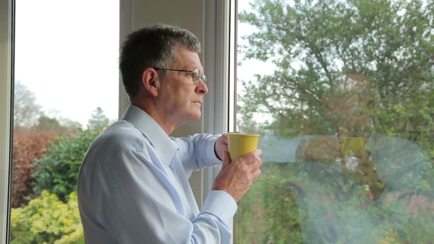 middle aged man looks out window Stock Footage Video (100% Royalty-free ...