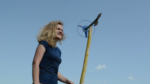 Beautiful Woman Walk Arround Spinning Windmill Stock Footage Video (100 ...