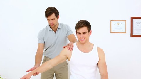 Physiotherapist Moving Patients Arm His Office Stock Footage Video (100 ...