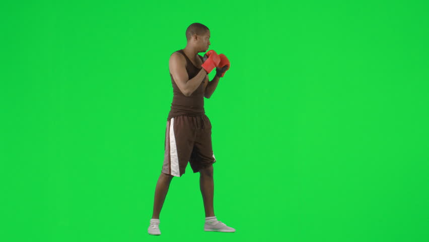 young ethnic man boxing against green Stock Footage Video (100% Royalty ...