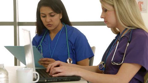 Two Female Nurses Medical Interns Working Stock Footage Video (100% ...