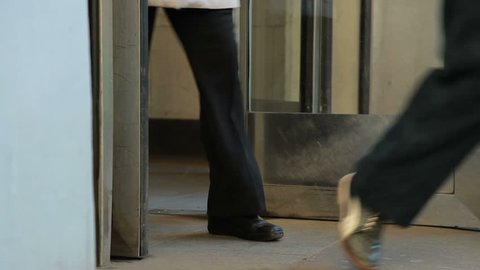 People Walking Through Entrance Doors Stock Footage Video (100% Royalty ...